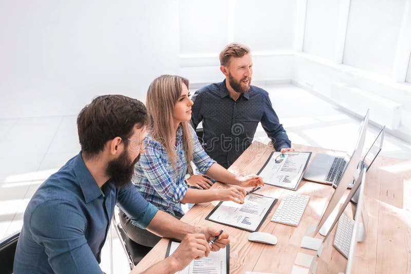 Experts Discussing Financial Documents at the Meeting Stock Image ...