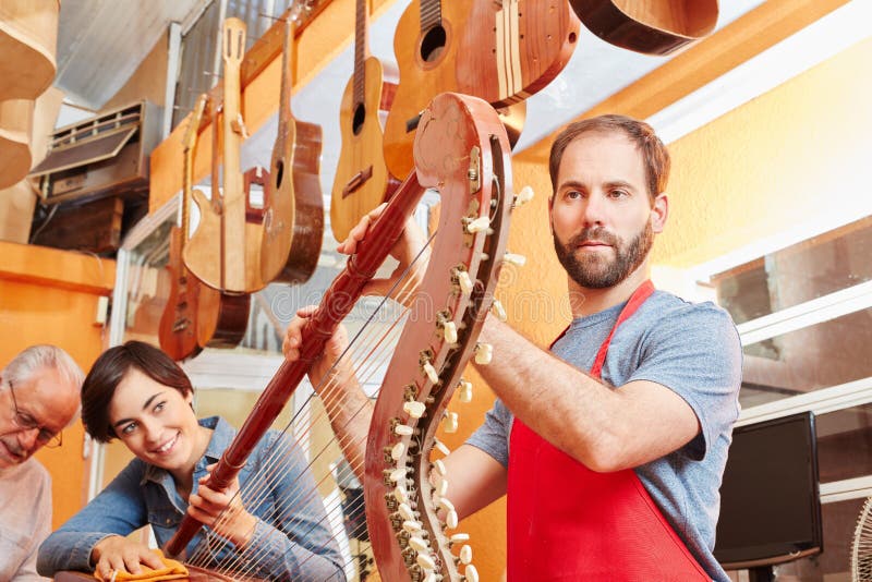 Experts Repairing Harp with Care Stock Image - Image of guitar ...