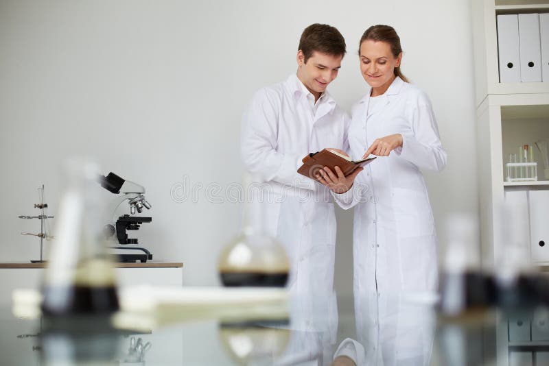 Experts at work stock image. Image of communicating, experiment - 35374749