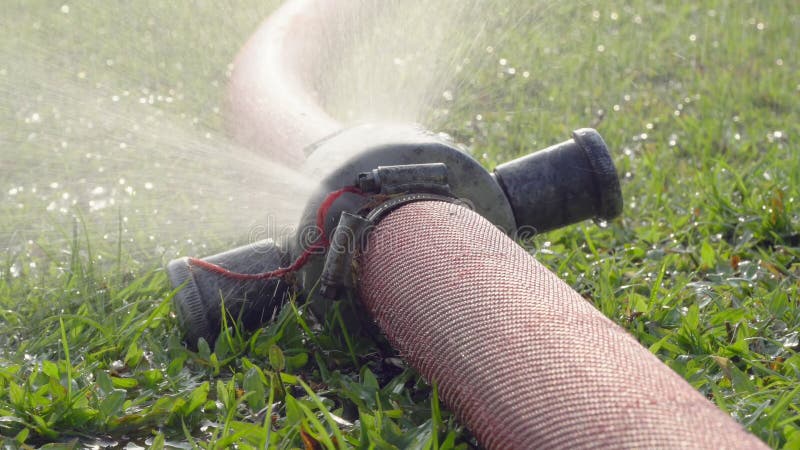 A Red Fire Hose Reel is Installed in a Modern Building, Emphasizing ...
