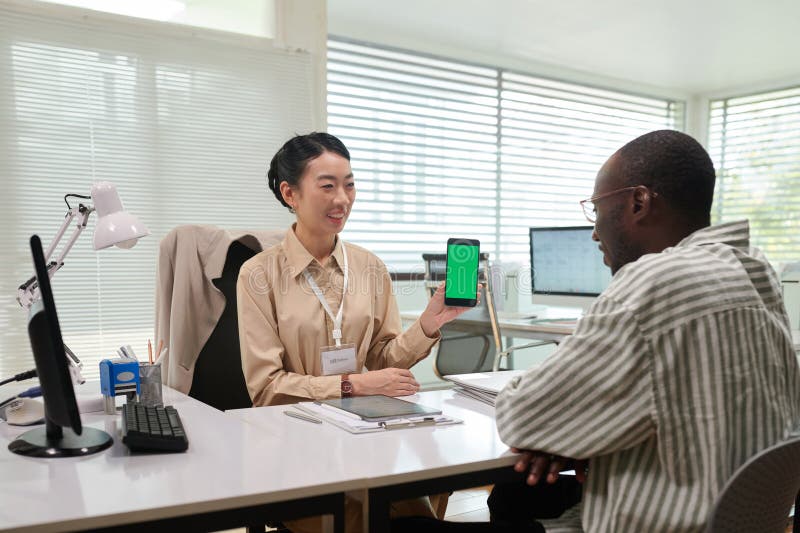 Explaining Client How To Use Banking App Stock Photo - Image of ...