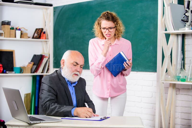 Explaining Difficult Topic. Student Puzzled by Some Information. School ...