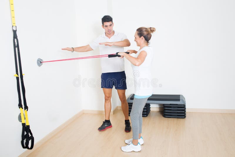 Explaining a Fitness Exercise Stock Image - Image of dark, attractive ...