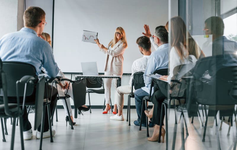 Explaining New Stuff for Students. Group of Professional Business ...