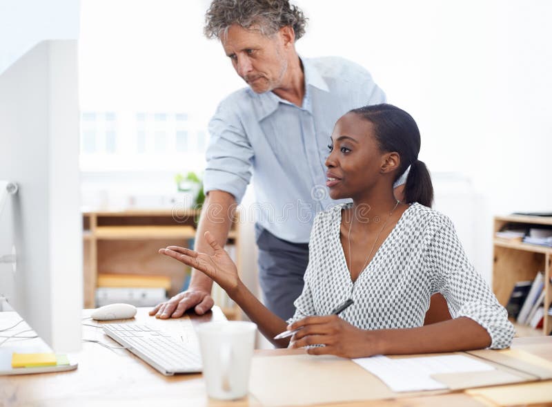 Explaining the Problem. an Employee and Her Boss Discussing Work in Her ...