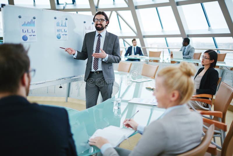 Explaining project stock image. Image of multiethnic - 65654627