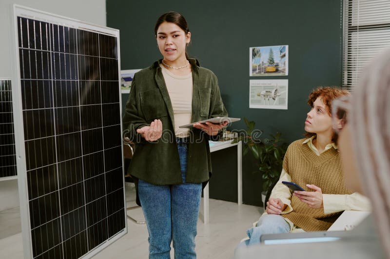 Explaining Solar Panel Advantages in a Workshop Setting Stock Image ...