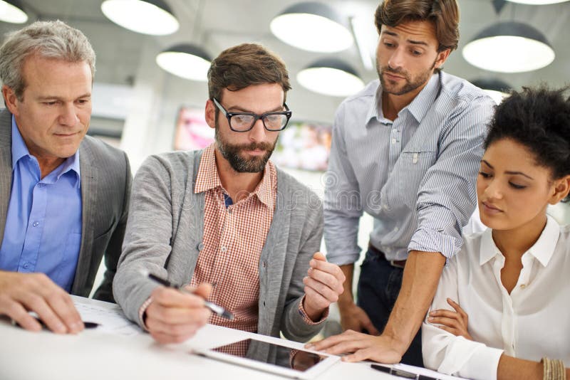 Explaining the Teams Progress. a Group of Young Professionals Working ...