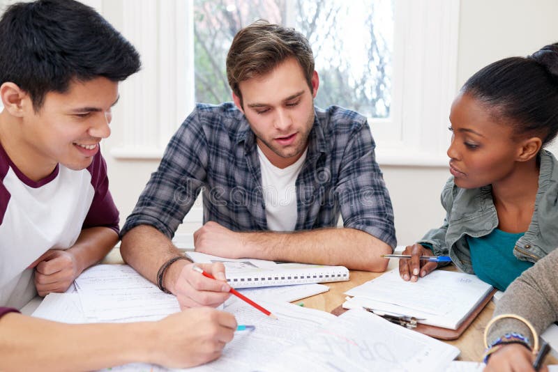 Explainng the Formula. Three University Students Studying. Stock Photo ...