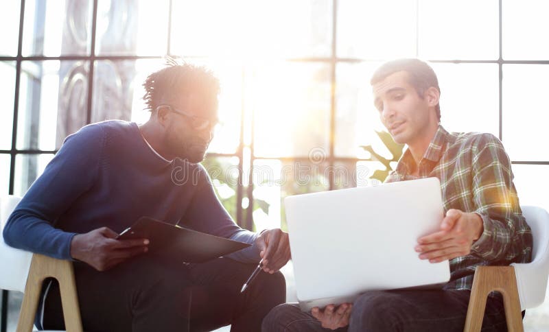 Friendly Colleagues Chat while Sitting in the Office, Promising Young ...