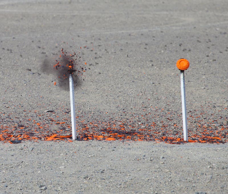 Exploded clay target stock photo. Image of orange, gray - 94773122