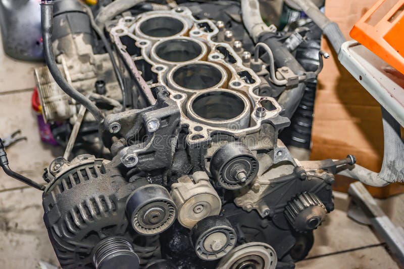 Exploded View of a Four-cylinder Engine Block Being Repaired in a ... Exploded View of a Four-cylinder Engine Block Being Repaired in a ...