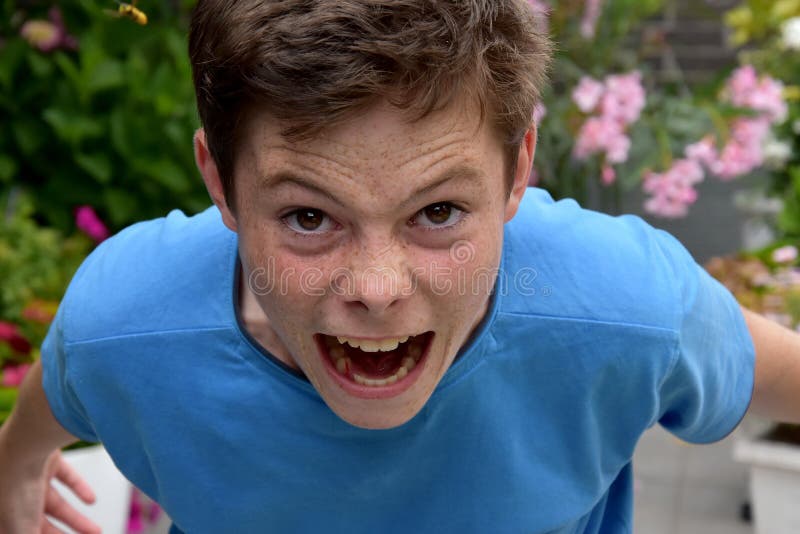 Horrified teenager boy stock image. Image of enraged - 61501133