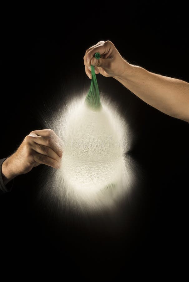 Exploding Balloon Isolated on Black Background Stock Image - Image of ...