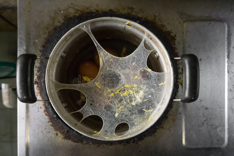 Exploding Boiled Eggs in Dirty Pot on a Dirty Gas Stove Stock Image ...