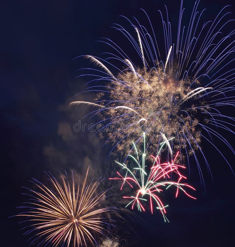 Exploding Firework Rockets with Green Balls and White Stripes Stock ...