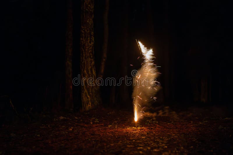 Exploding Fireworks on the Ground at Night. Stock Image - Image of ...