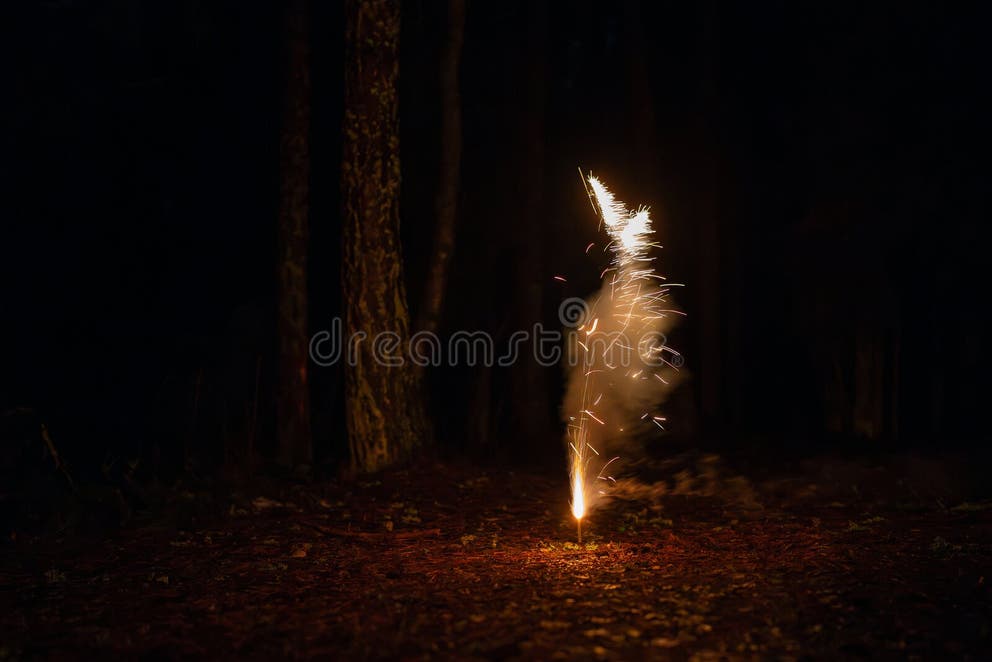 Exploding Fireworks on the Ground at Night. Stock Image - Image of ...