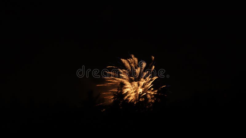 Exploding Gold Fireworks on a Black Background Stock Image - Image of ...