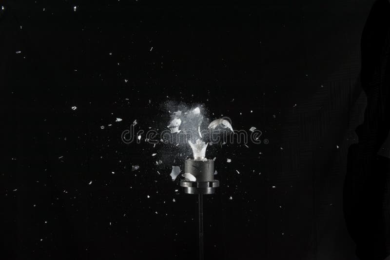 Exploding light bulb stock photo. Image of shattering - 94651162