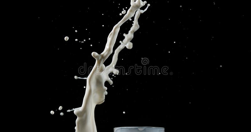 Exploding Milk Against Black Background Stock Photo - Image of milk ...