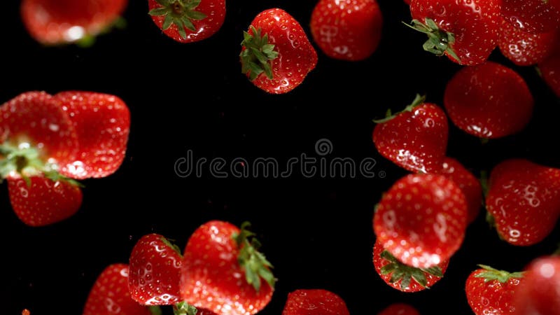 Exploding Strawberries on a Black Background. Stock Footage - Video of ...