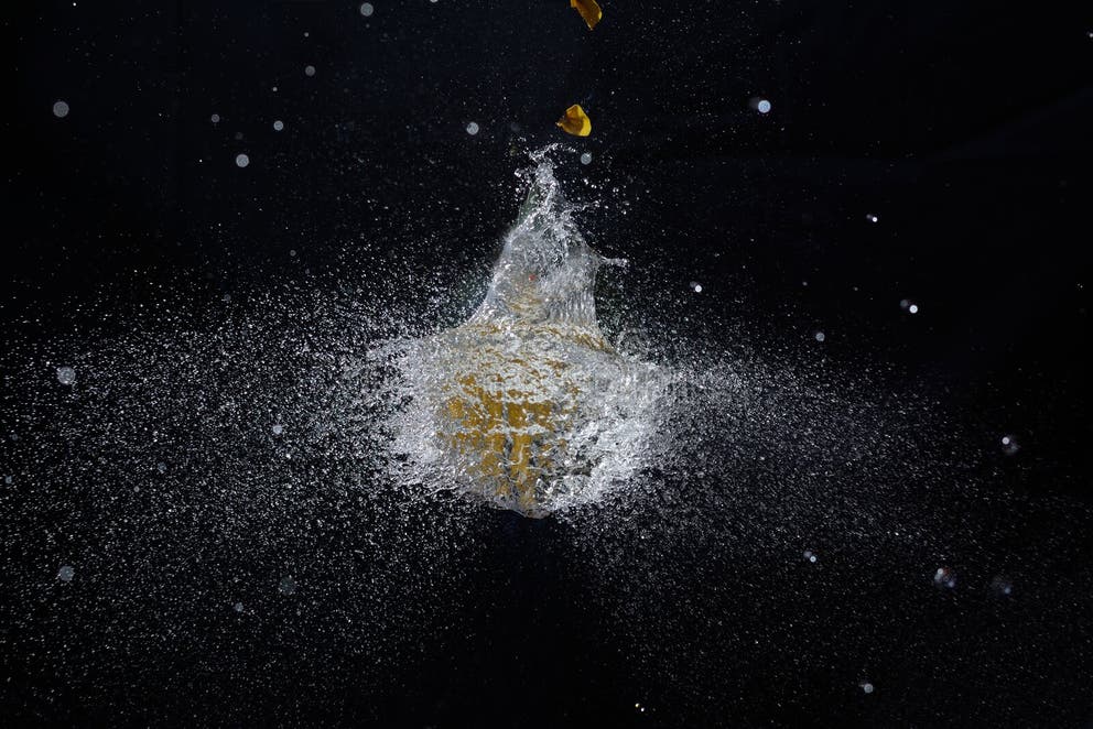 Exploding water balloon stock image. Image of droplets - 56337461