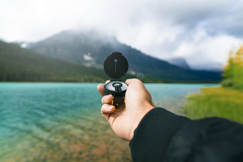 Exploration Adventure Concept in Mountains with Compass Stock Photo ...