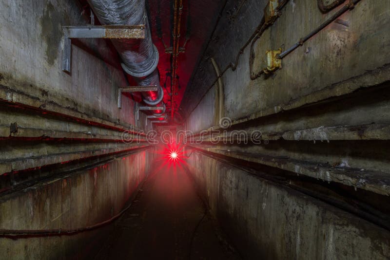 Exploration of a Bunker from the Second World War with a Red Flashlight ...