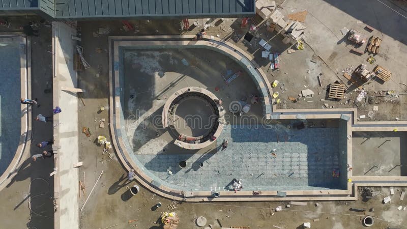 Facade and Pool Build: 4K Aerial Tile Laying Process Stock Footage ...
