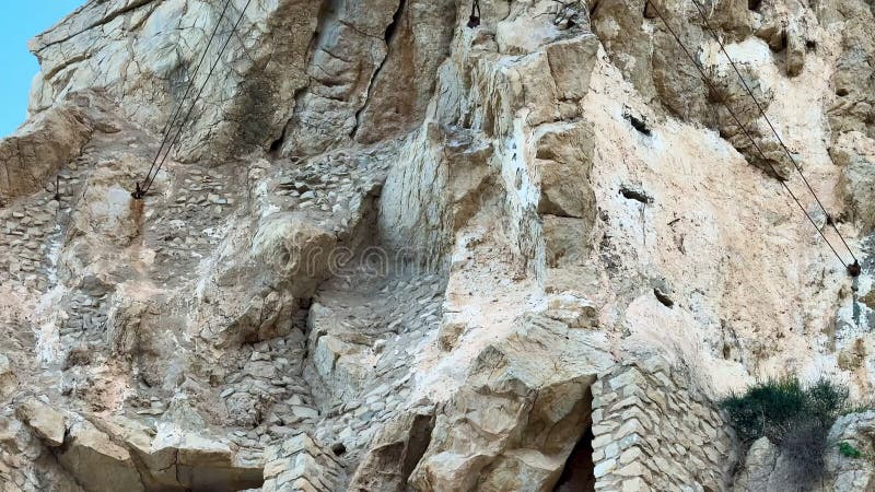 Explore the Historic Cliffside Architecture Featuring Unique Rock ...