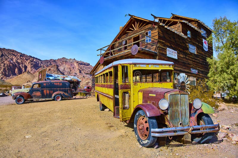 Vintage Desert Scene with Rusted School Bus and Van in Nelson Ghost ...