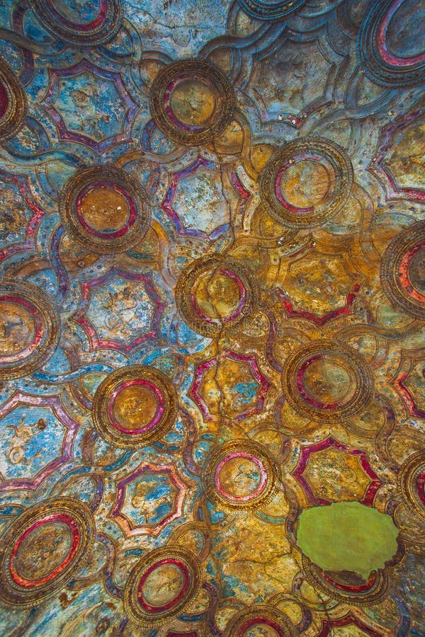 Explore the Vibrant Ceiling Art with Intricate Circular Patterns and ...