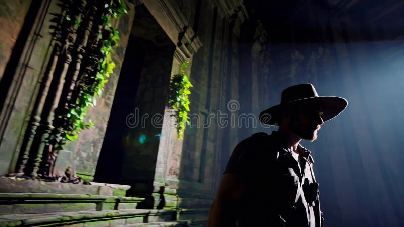 Explorer in Ancient Temple with Dramatic Light Stock Footage - Video of ...