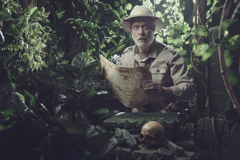 Explorer Checking a Map in the Forest Stock Image - Image of forest ...