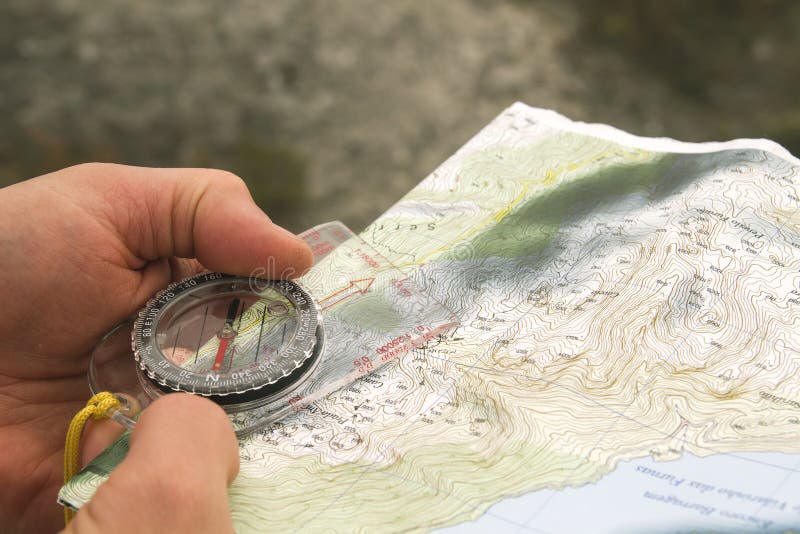 Explorer Using a Compass and Topographic Map Stock Photo - Image of ...