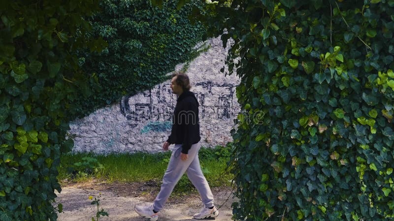 Exploring Abandoned Architecture Overgrown by Nature Stock Footage ...