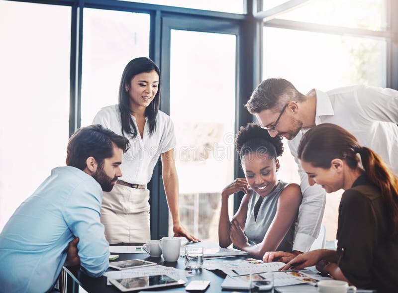 Exploring All Their Ideas. a Group of Diverse Businesspeople Having a ...