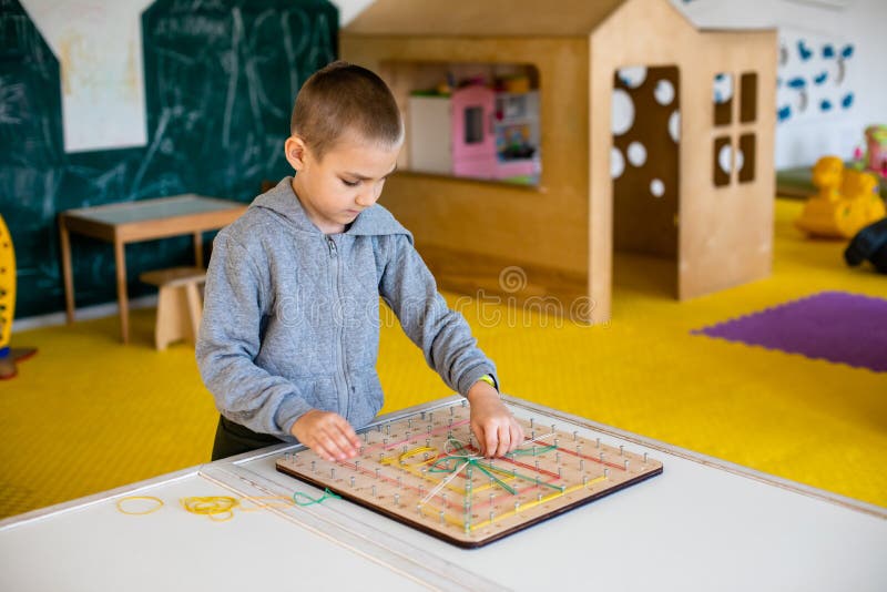 Exploring Basic Math and Geometry Concepts with Geoboard Stock Image ...