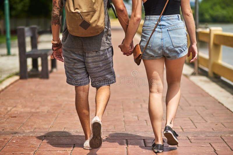 Exploring Hand in Hand. Rearview Shot of an Affectionate Young Couple ...