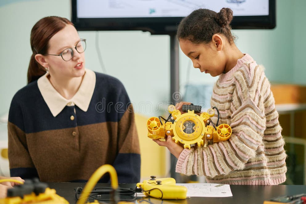 Exploring Robot Technology in Hands-on Learning Environment Stock Photo ...