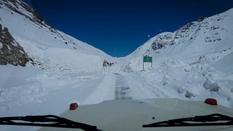 Exploring Shinkula Pass with Snowy Narrow Path Surrounded by Towering ...