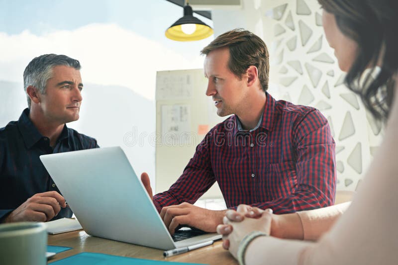 Exploring, Testing and Refining Ideas. a Group of Businesspeople Having ...