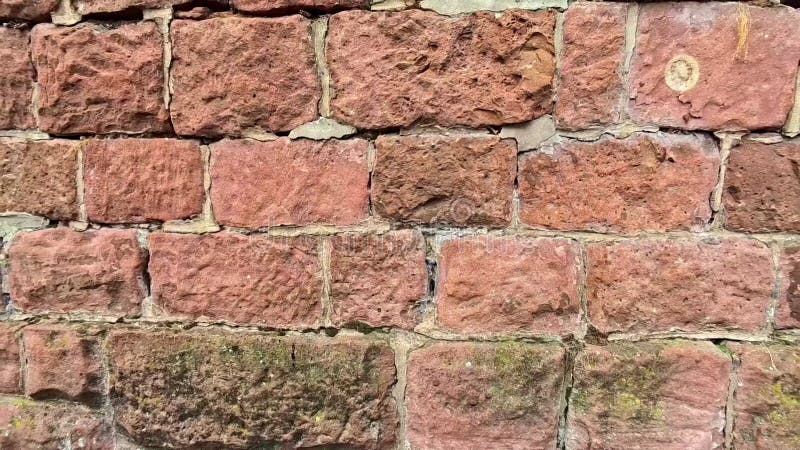 Exploring Vibrant Red Stone Wall Textures in Historical Architecture ...