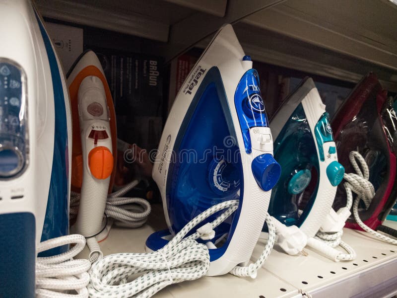 Exploring a Vibrant Selection of Irons on Display at a Home Goods Store ...