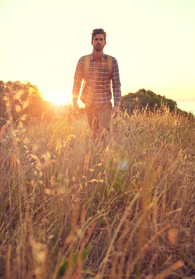 Exploring the Wilderness. a Handsome Young Man Enjoying a Hike. Stock ...