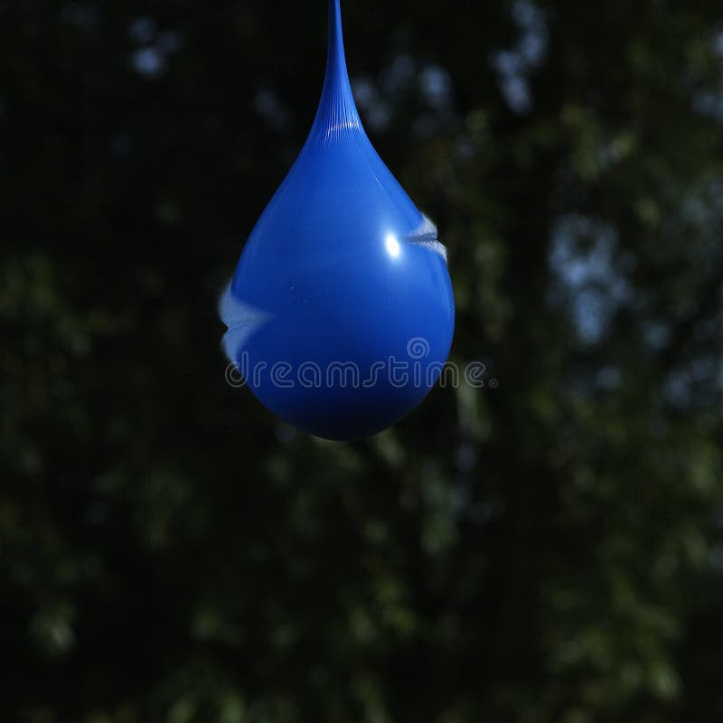 Explosing Blue Balloon with Water Inside, Movement Sequence Stock Photo ...