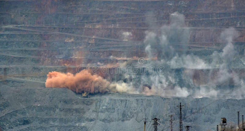 Rock explosion in a quarry stock photo. Image of iron - 105688118