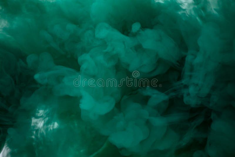 Green Smoke Bomb Exploding Against White Background Stock Photo - Image ...