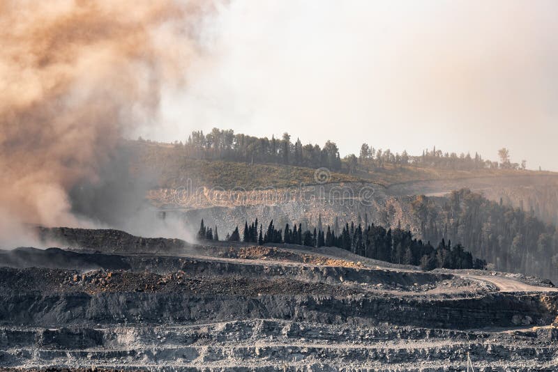 Explosive Works on Open Pit Coal Mine Industry with Dust and Puffs of ...